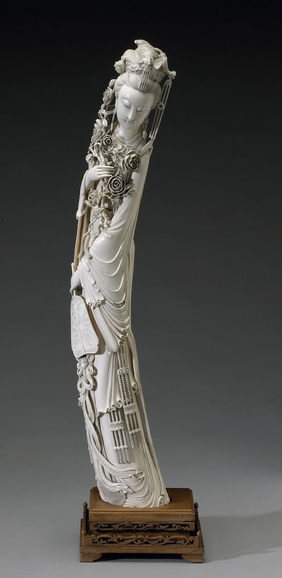 Bonhams : A large carved ivory figure of a court beauty