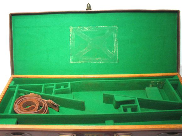 Bonhams : An oak and leather double shotgun trunk case