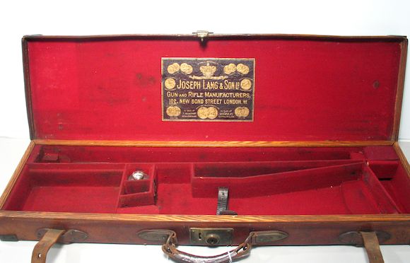 Bonhams : A J. Lang & Son oak and leather shotgun trunk case