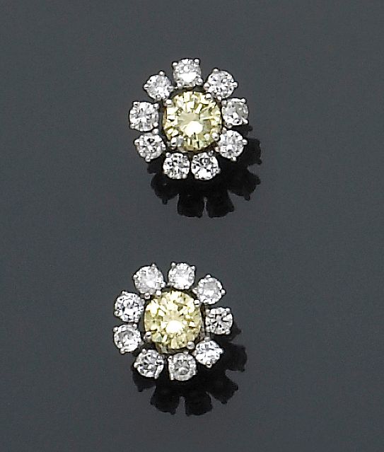 Bonhams : A pair of fancy color diamond, diamond and platinum earrings