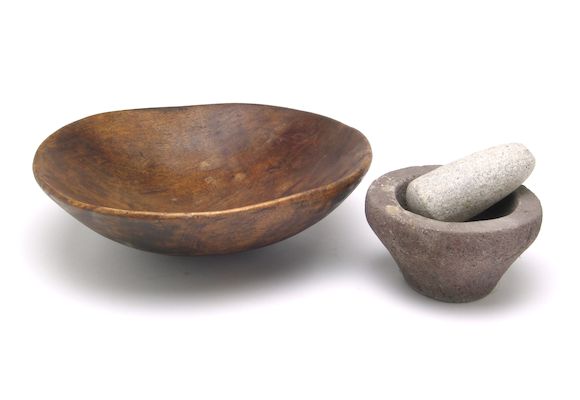Bonhams : A Native American stone mortar and pestle together with a ...