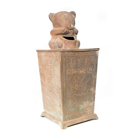 Bonhams : A cast iron container with bear