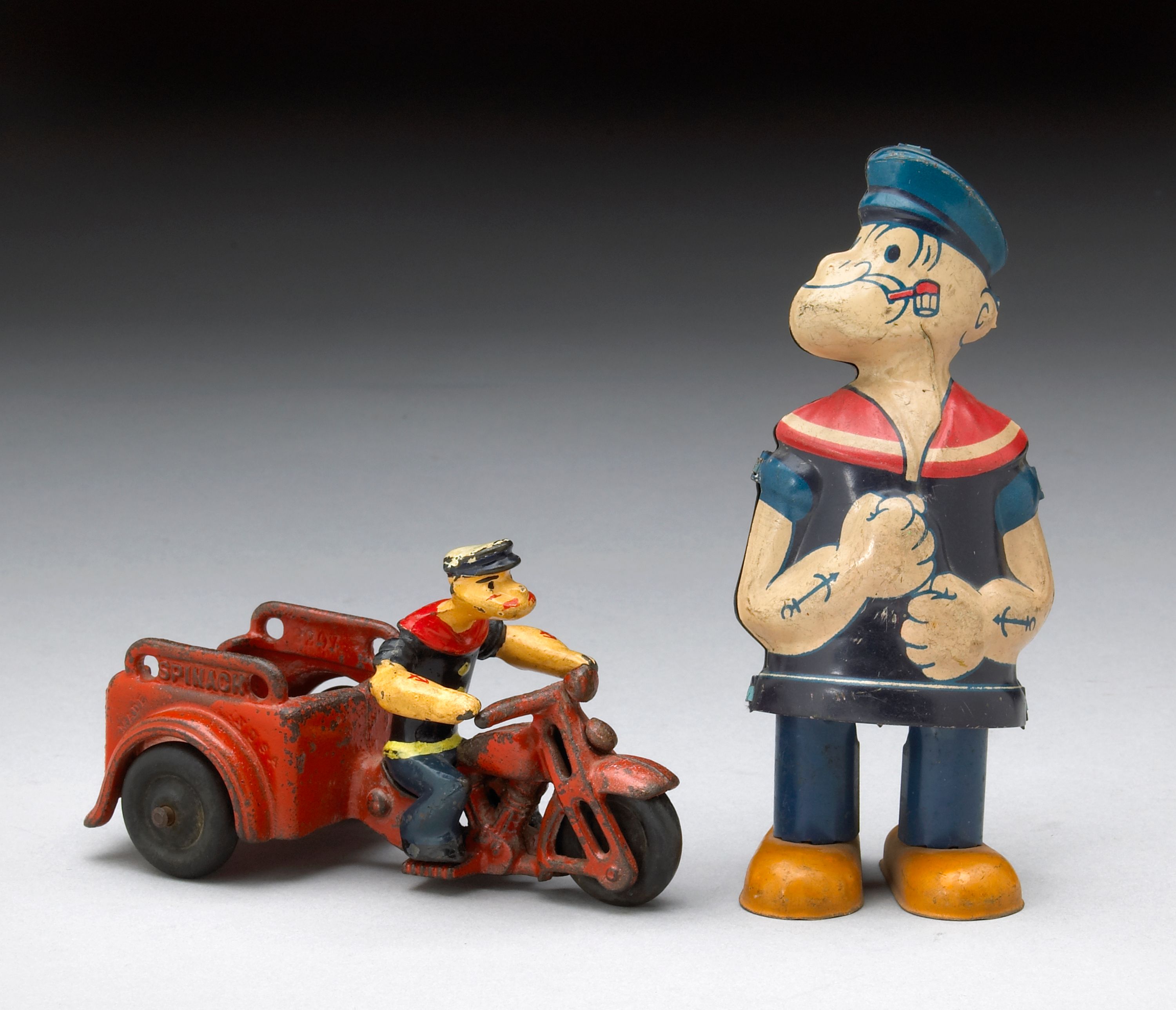 Bonhams Cars : A Popeye toy grouping Length: 5in and Height: 6in
