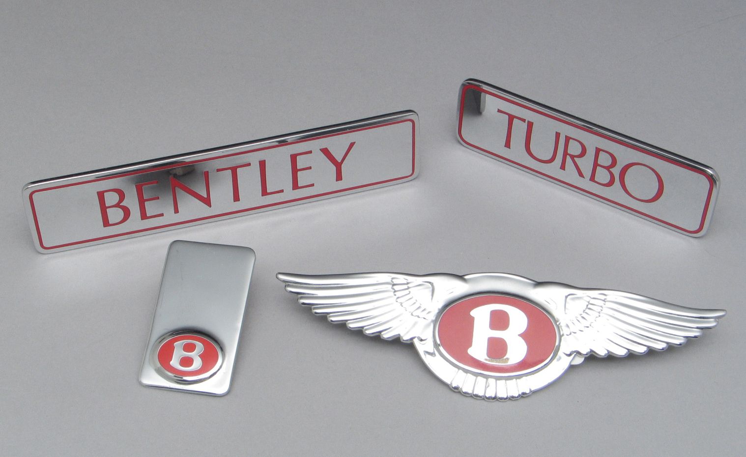 Bonhams Cars : A set of four Bentley Turbo badges,