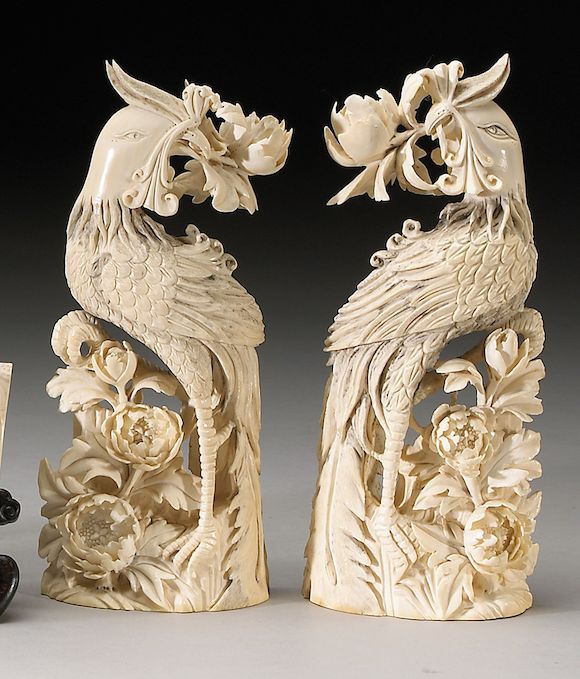 Bonhams : A pair of tinted ivory phoenix