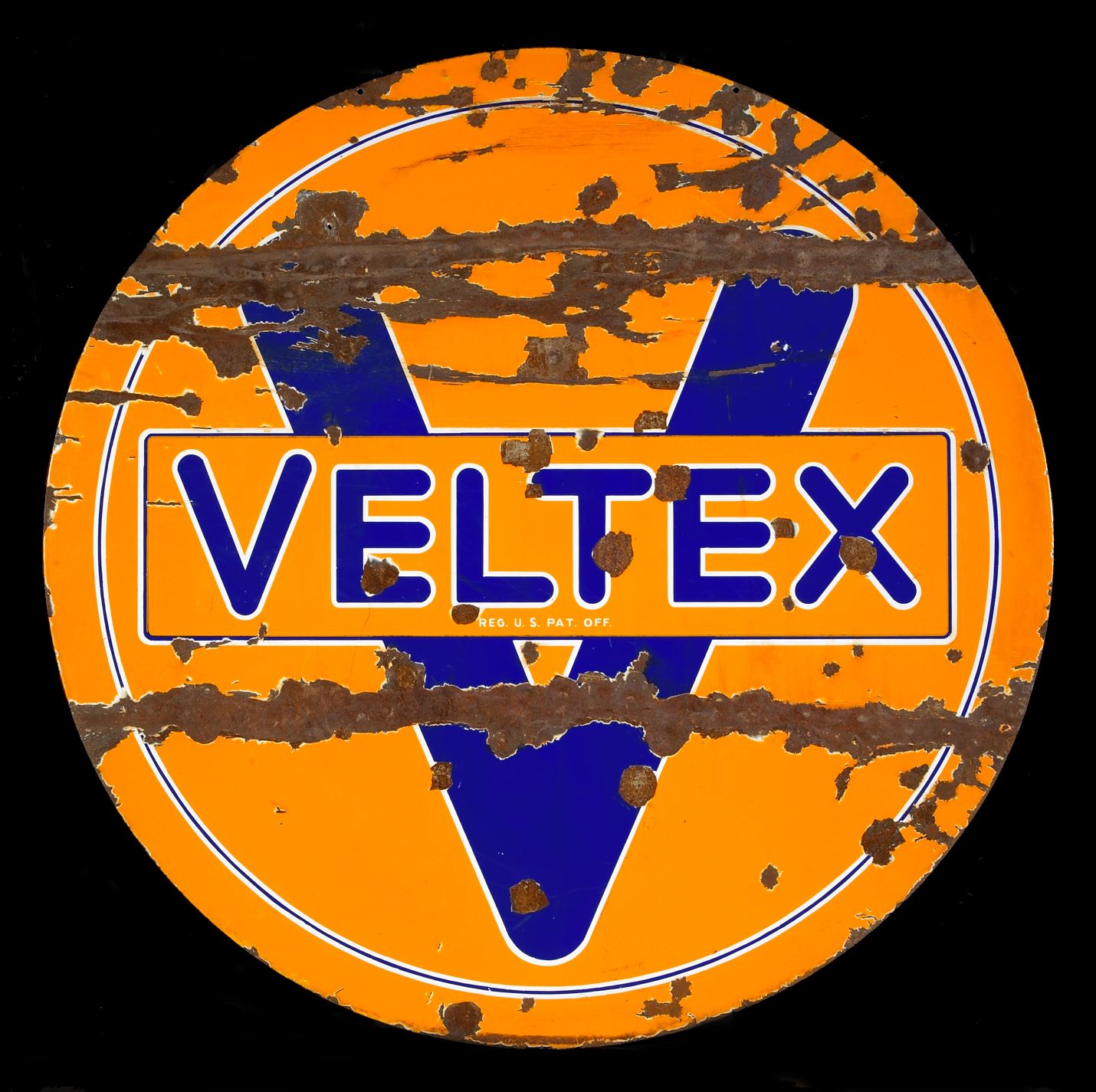 Bonhams Cars : A Veltex enamel advertising sign Diameter: 48in