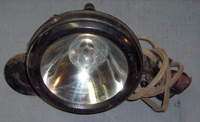 Bonhams Cars : An Old Sol spotlamp by Hawthorne Mfg Co., patented 1914,