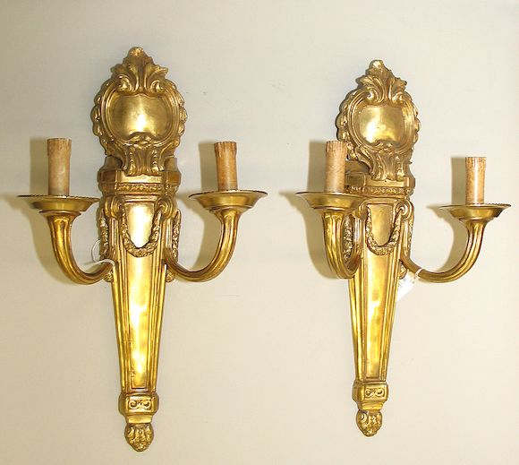 Bonhams : A pair of Louis XVI style gilt bronze two light bras de lumiere