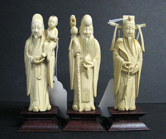 Bonhams : A carved ivory set of the 'Three Stars of Happiness