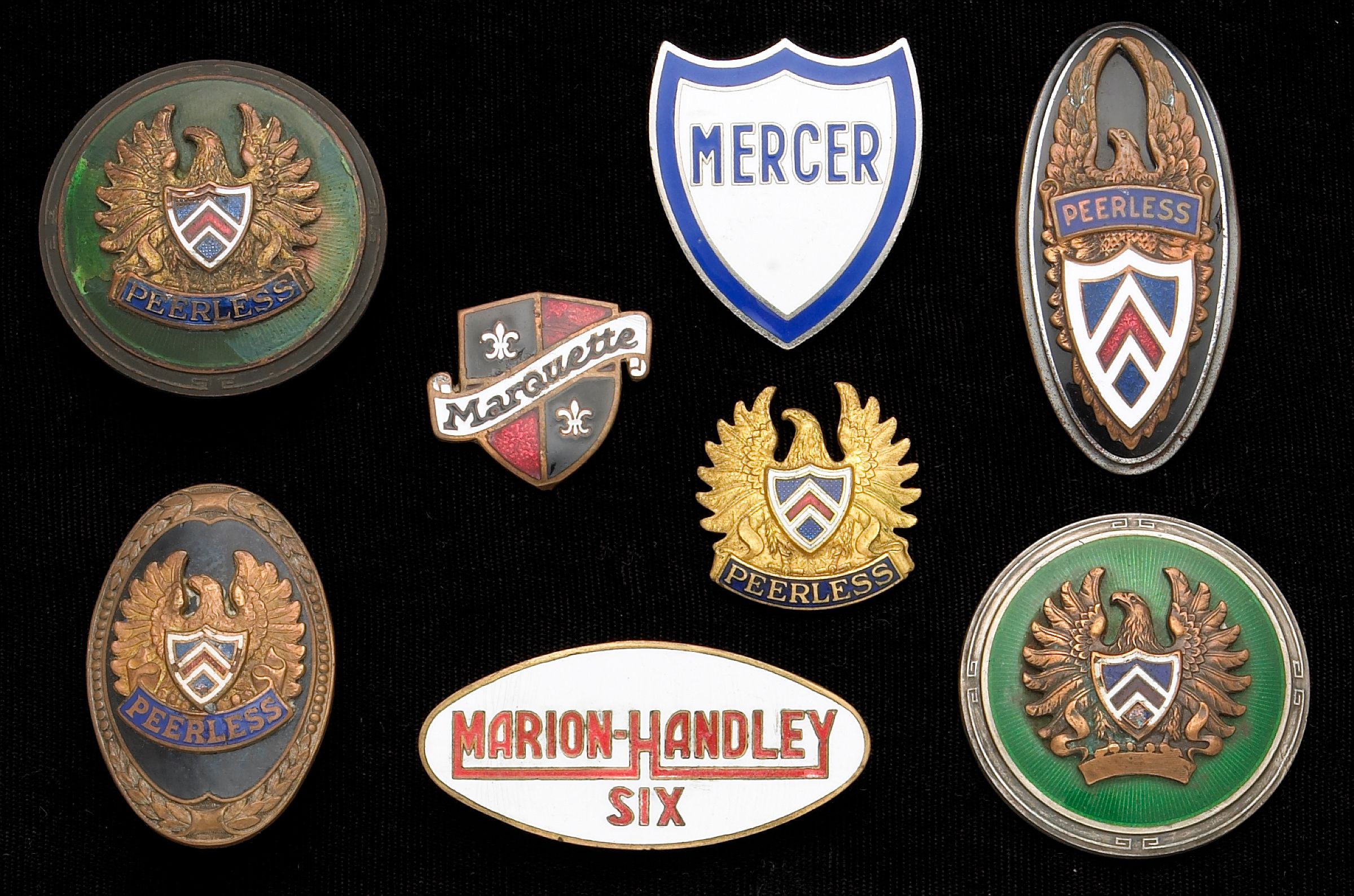 Bonhams Cars : A grouping of eight motor vehicle emblems,