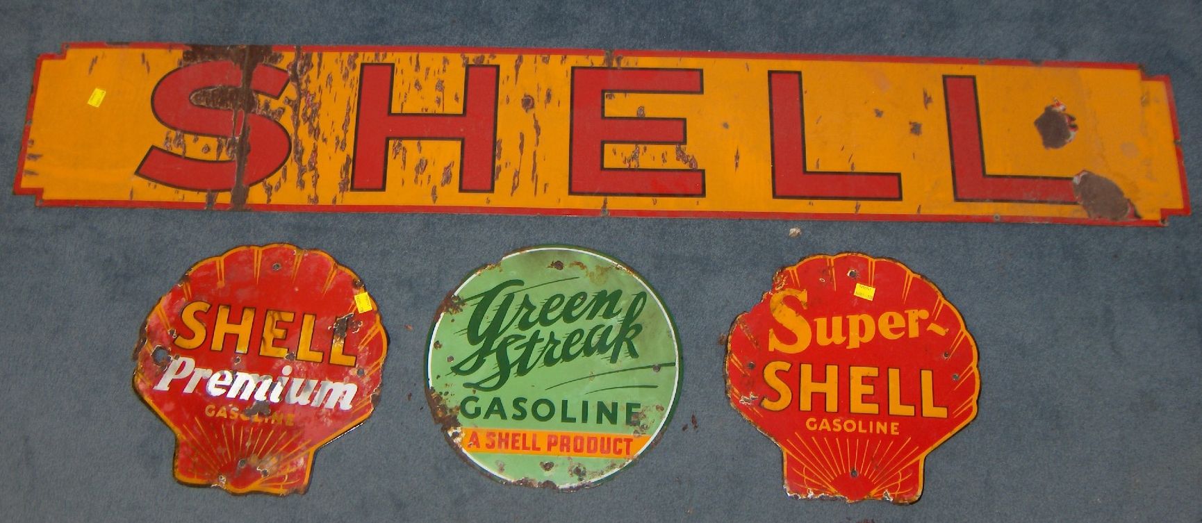 Bonhams Cars : A group of four Shell Gasoline enamel advertising signs ...