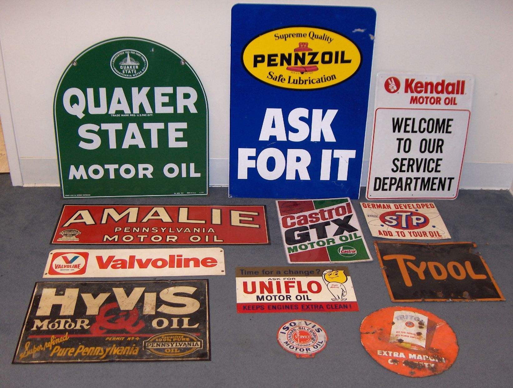 Bonhams Cars : An assortment of oil advertising signs, the largest ...