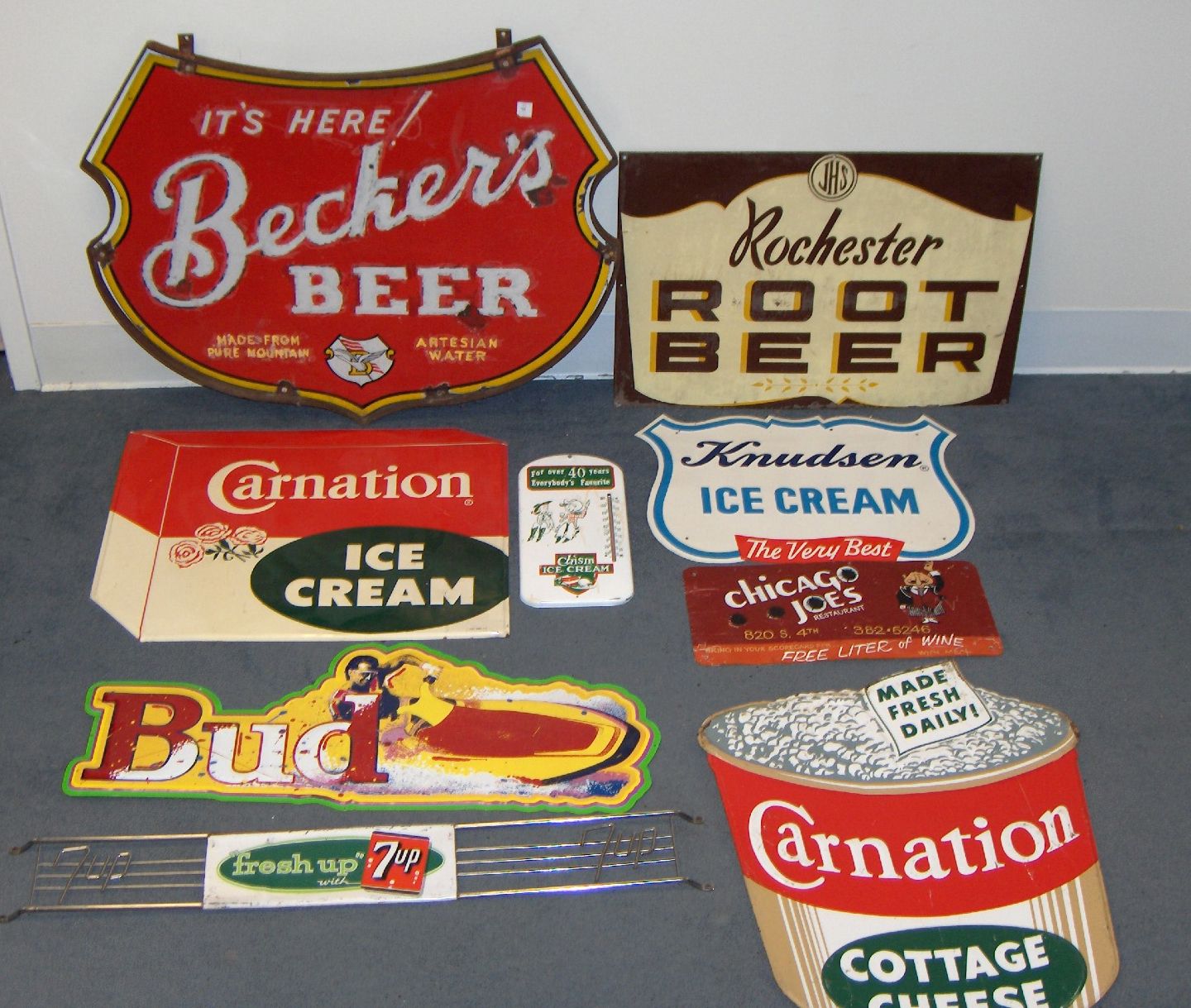 Bonhams Cars : A collection of nine commercial advertising signs, the ...
