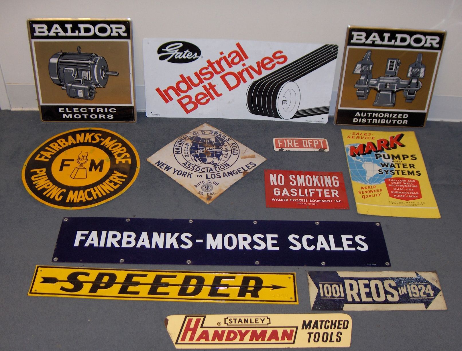 Bonhams Cars : A collection of twelve assorted signs, the largest 50in wide