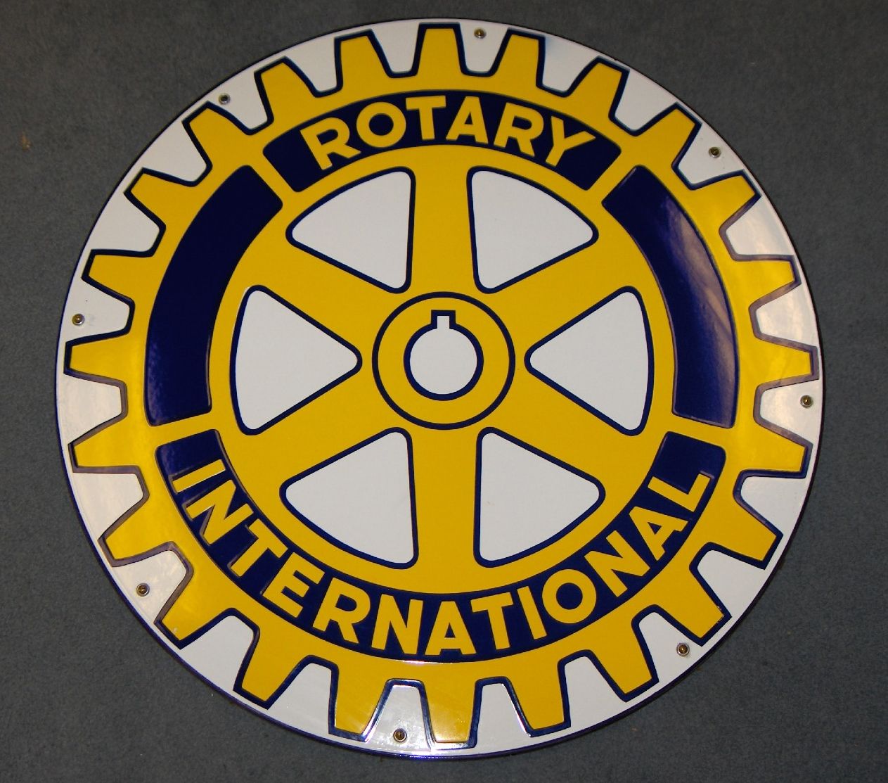 Bonhams Cars : A large Rotary International enamel sign, 30in diameter