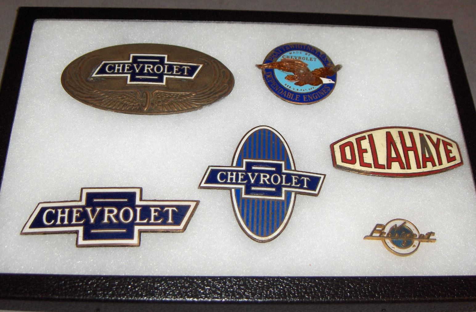 Bonhams Cars : A group of five motor vehicle manufacturers emblems,