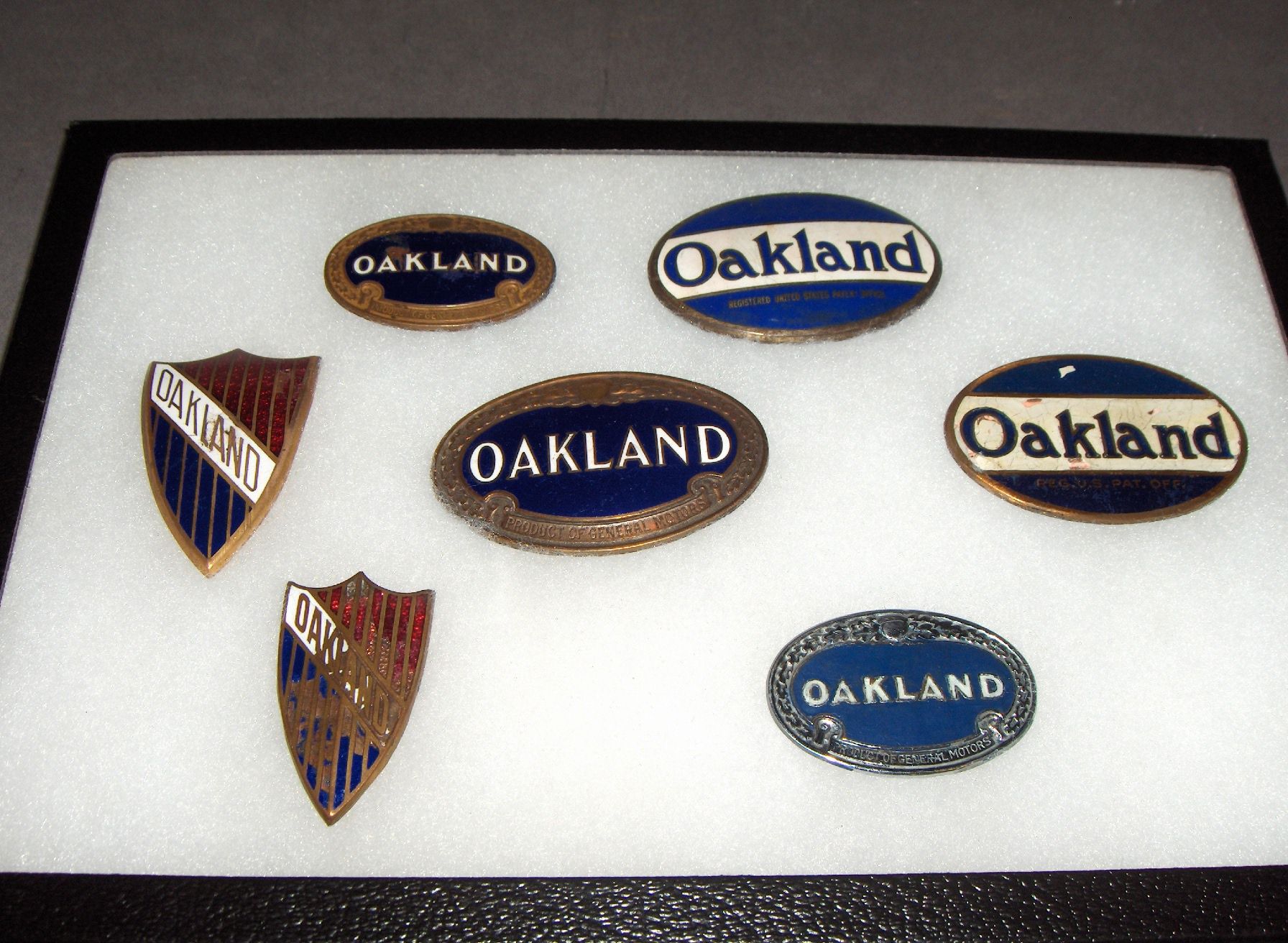 Bonhams Cars : A collection of seven Oakland motor vehicle badges and ...