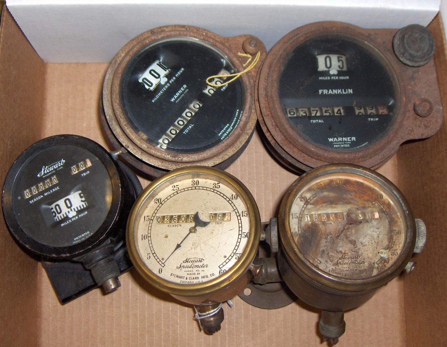 Bonhams Cars : A group of five speedometers,