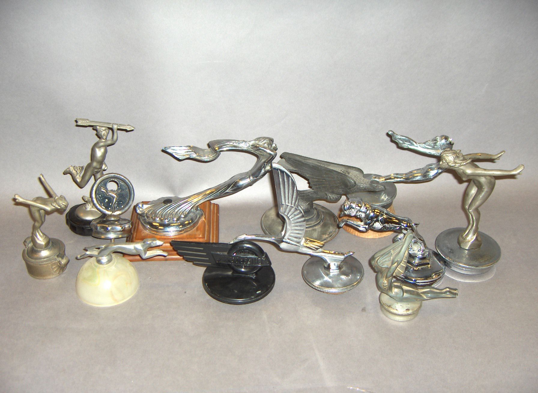 Bonhams Cars : A collection of twelve assorted mascots,