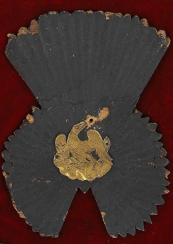 Bonhams : An eagle on fan cockade