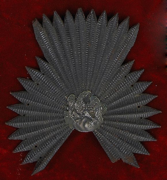 Bonhams : An eagle on fan cockade