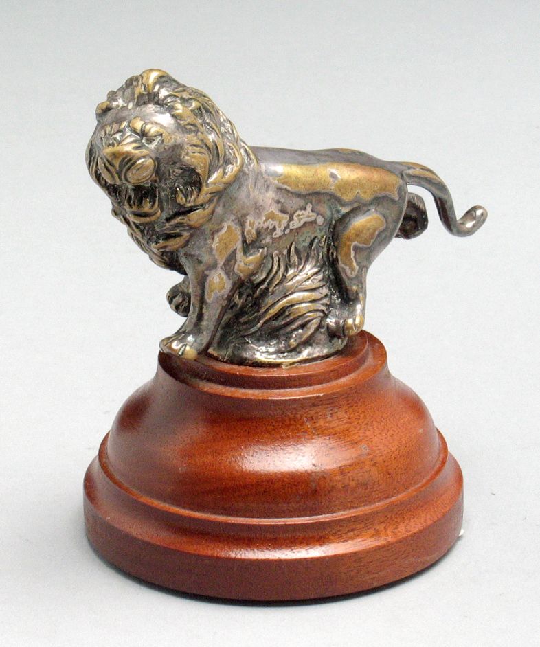 Bonhams Cars : A roaring lion mascot, French, circa 1920, 5in long