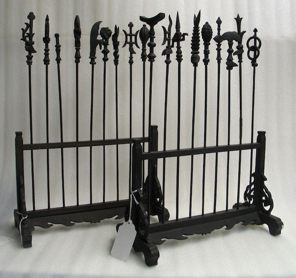Bonhams : A small set of eighteen carved wood ceremonial weapons