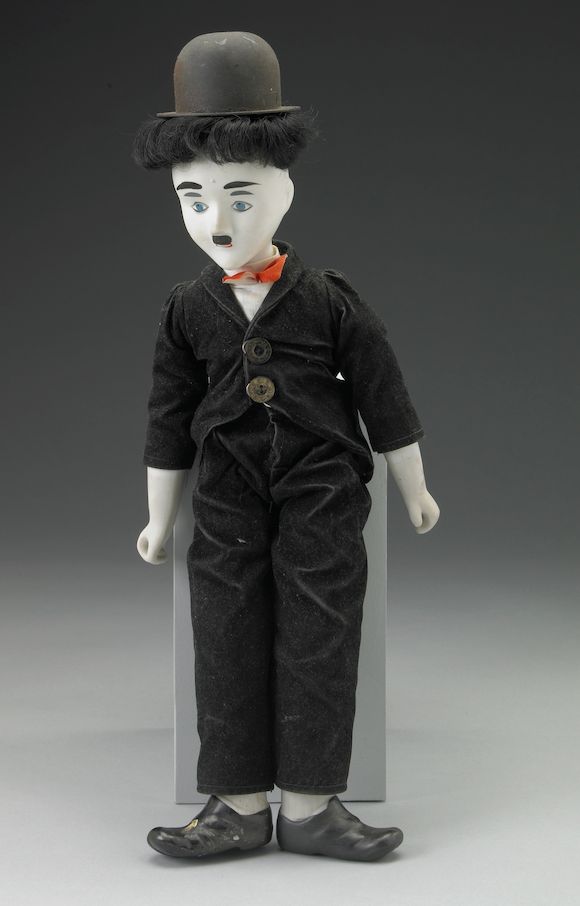 Bonhams : A Charlie Chaplin porcelain doll relating to the stage ...