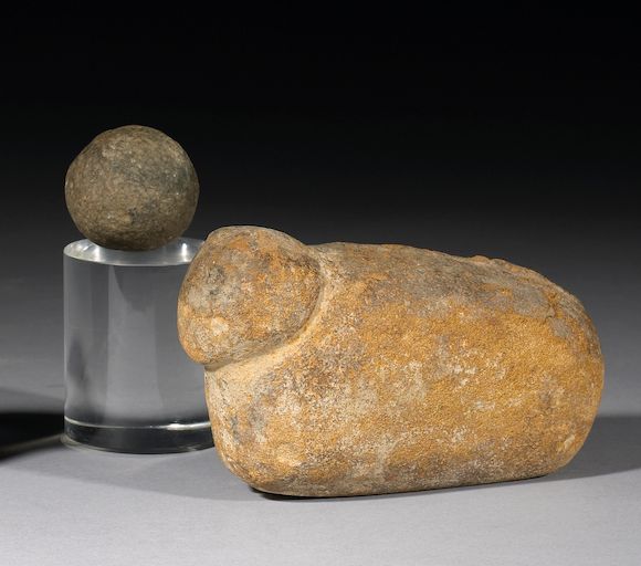 Bonhams : Two Pueblo carved stone effigies