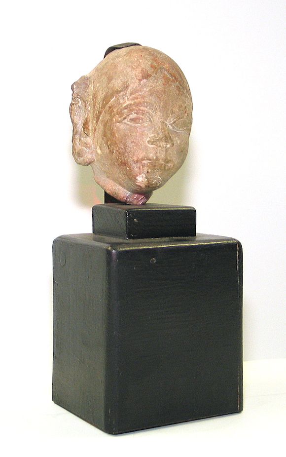 Bonhams : An Indian carved stone head