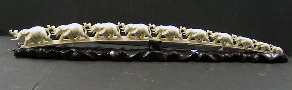 Bonhams : An ivory tusk carving of an elephant bridge