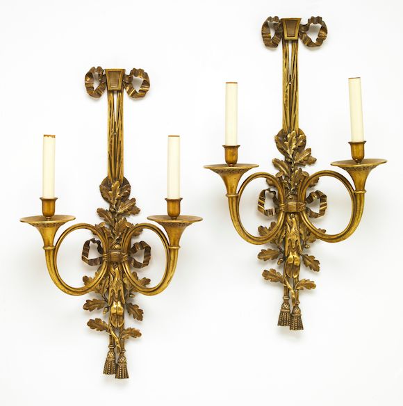 Bonhams : A pair of Louis XVI style gilt bronze two light bras de lumiere