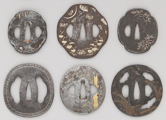 Bonhams : Nine inlay decorated iron tsuba Edo and Meiji Periods