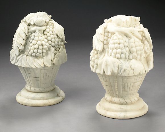 Bonhams : A pair of carved marble finials