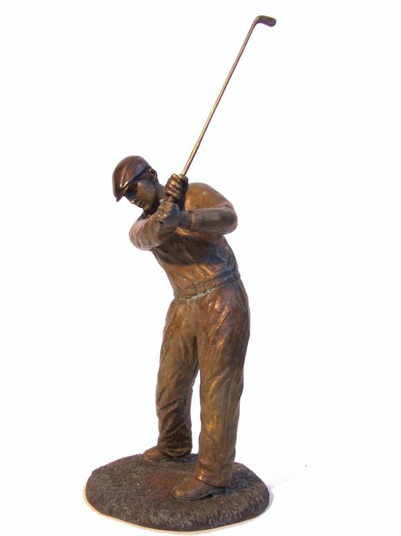 Bonhams : A bronze golfing figure,