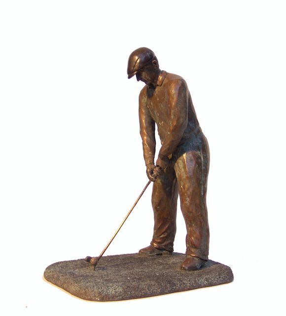 Bonhams : A bronze golfing figure,