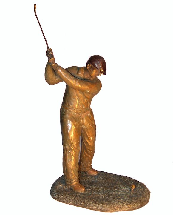 Bonhams : A bronze golfing figure,
