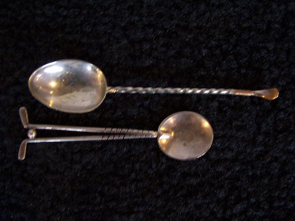 Bonhams : A collection of mainly sterling golf spoons,