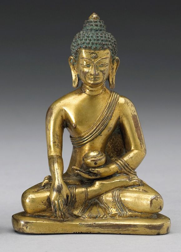 Bonhams : A gilt bronze figure of Sakyamuni Tibet/Nepal, 15th century