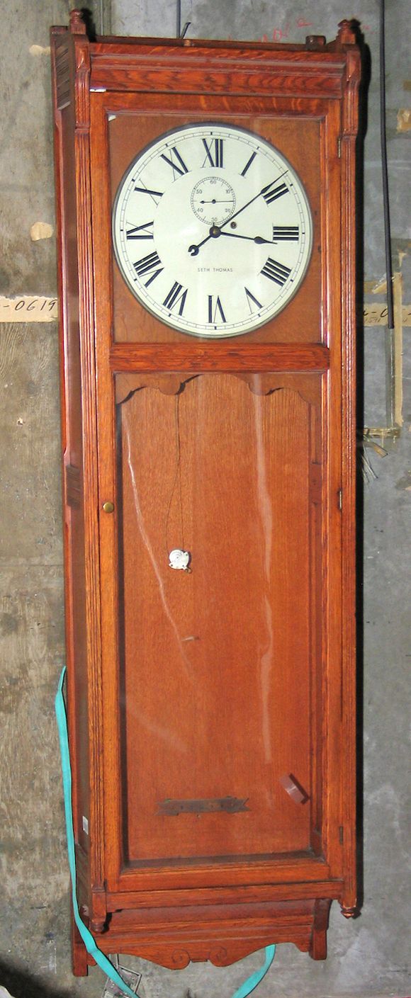 Bonhams : A Seth Thomas oak regulator clock