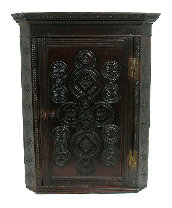 Bonhams : A Spanish Colonial style corner cupboard