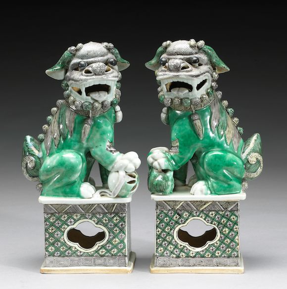 Bonhams : A pair of famille verte enameled porcelain fu lions 19th Century