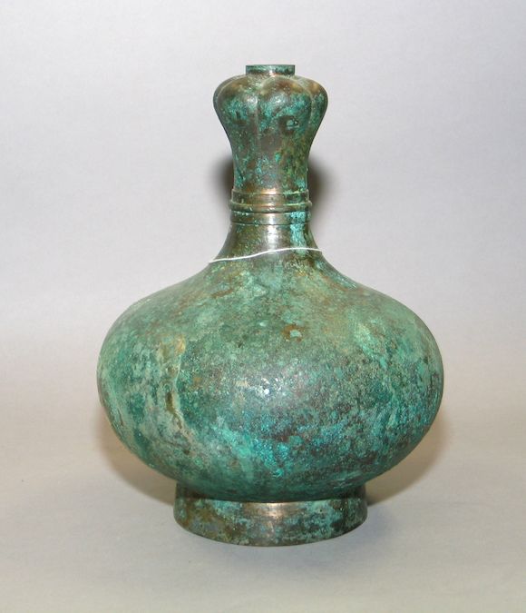 Bonhams : A Han style bronze garlic headed bottle