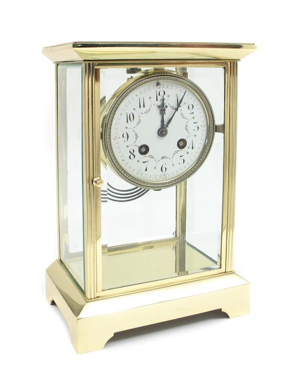 Bonhams A French Brass And Four Glass Mantel Clock