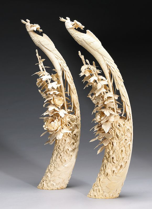 Bonhams : A pair of elaborately pieced ivory phoenix carvings