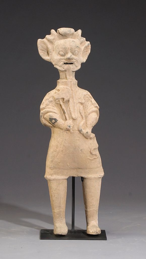 Bonhams : A molded pottery mortuary figure of a demon Han Dynasty