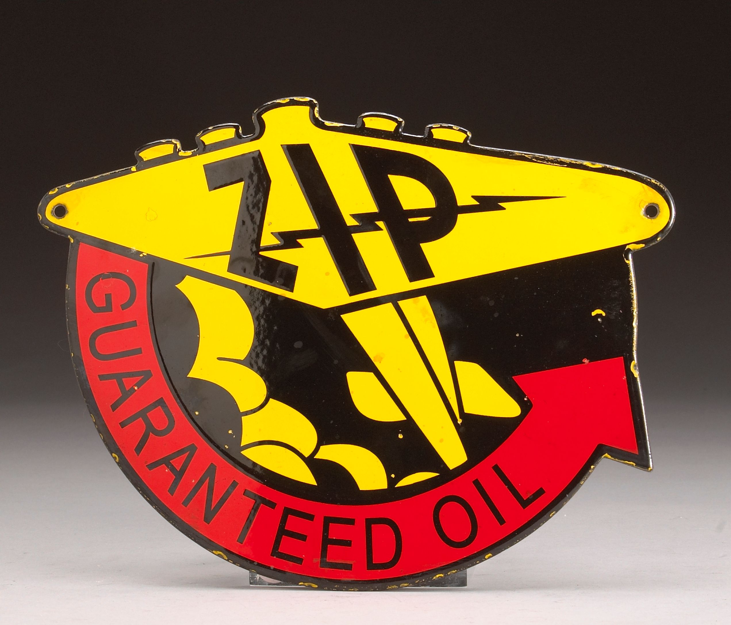 Bonhams Cars : An ROP 'ZIP Guaranteed Oil' shaped enamel sign,