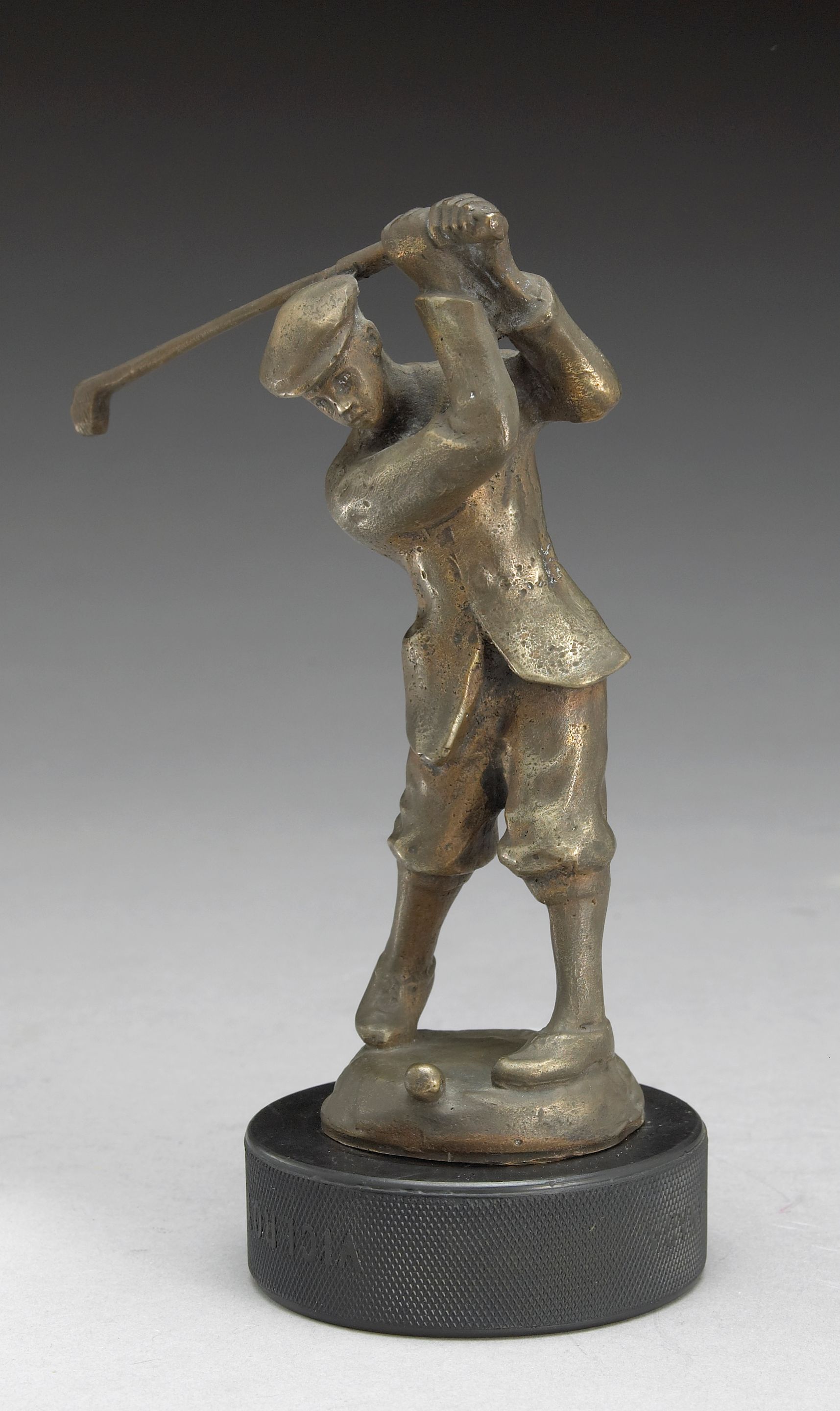 Bonhams Cars : A golfer mascot after E. Bregeon,