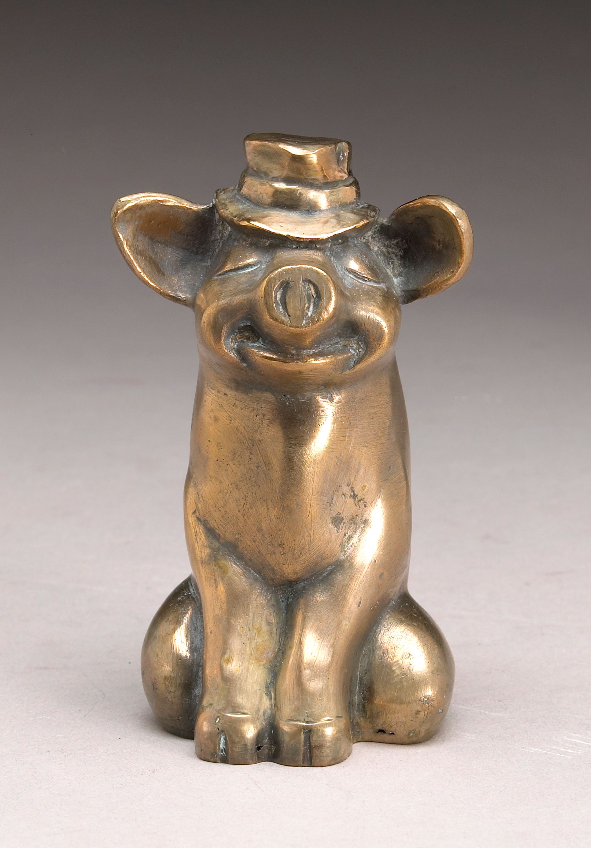 Bonhams Cars : A comical smiling pig mascot,