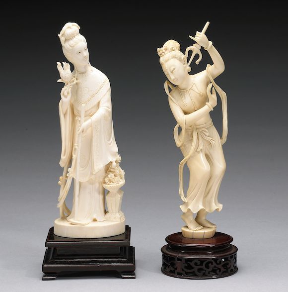 Bonhams : Two carved ivory female figures